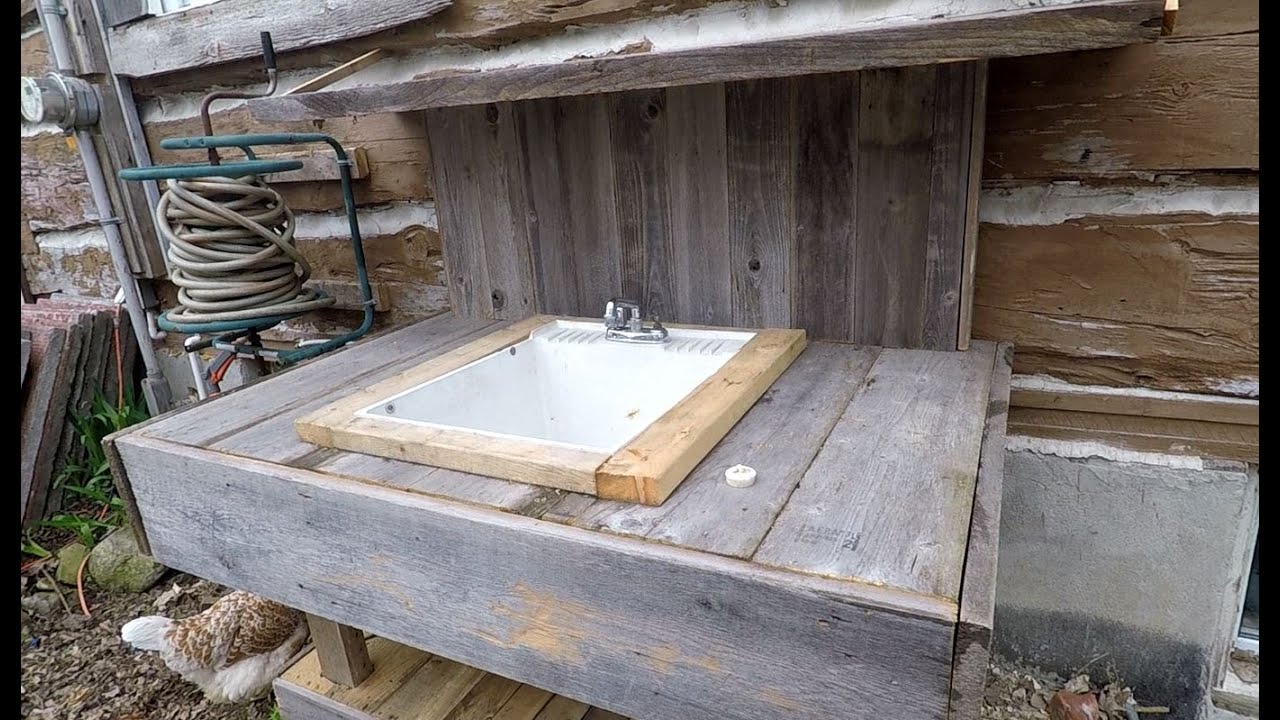 Simple rustic outdoor garden sink made from pallets and scrap wood ...