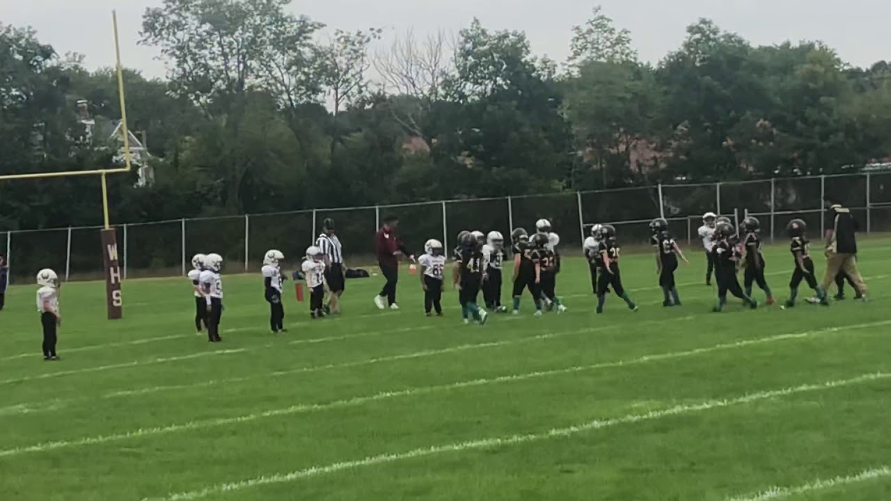 Woonsocket playing football - YouTube