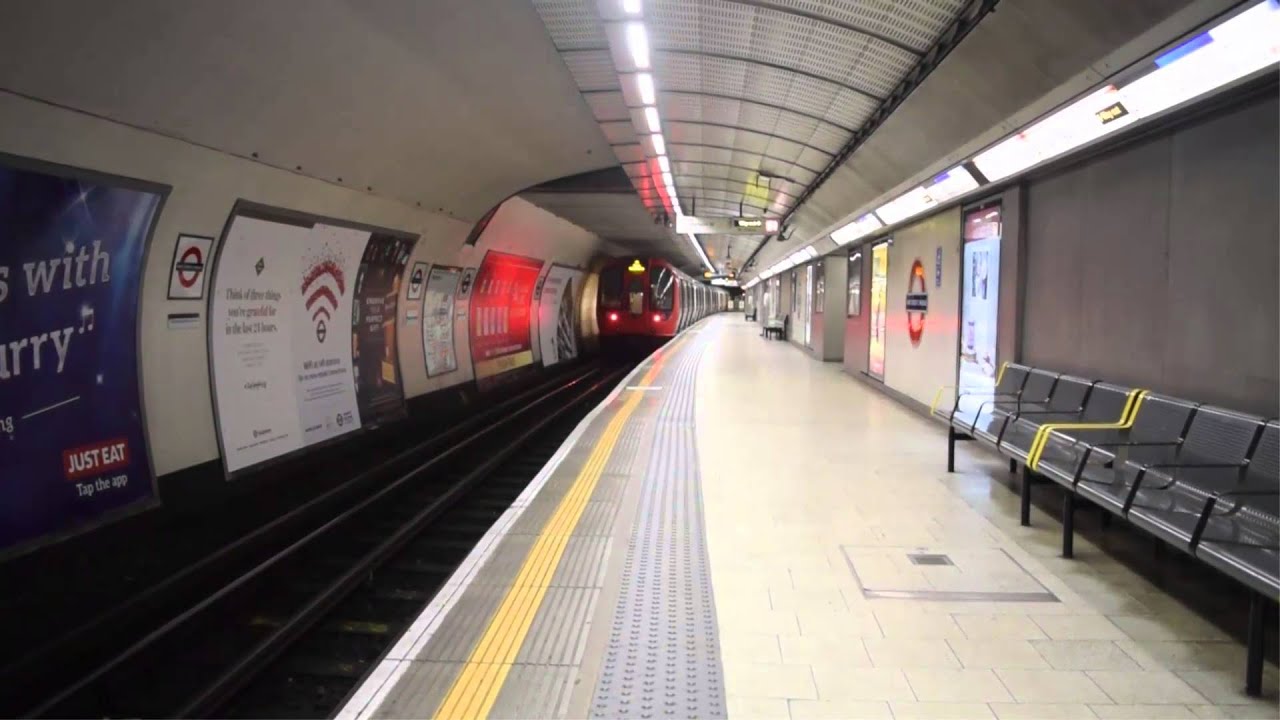 London Underground Metropolitan line S8 stock departs at Kings Cross St ...