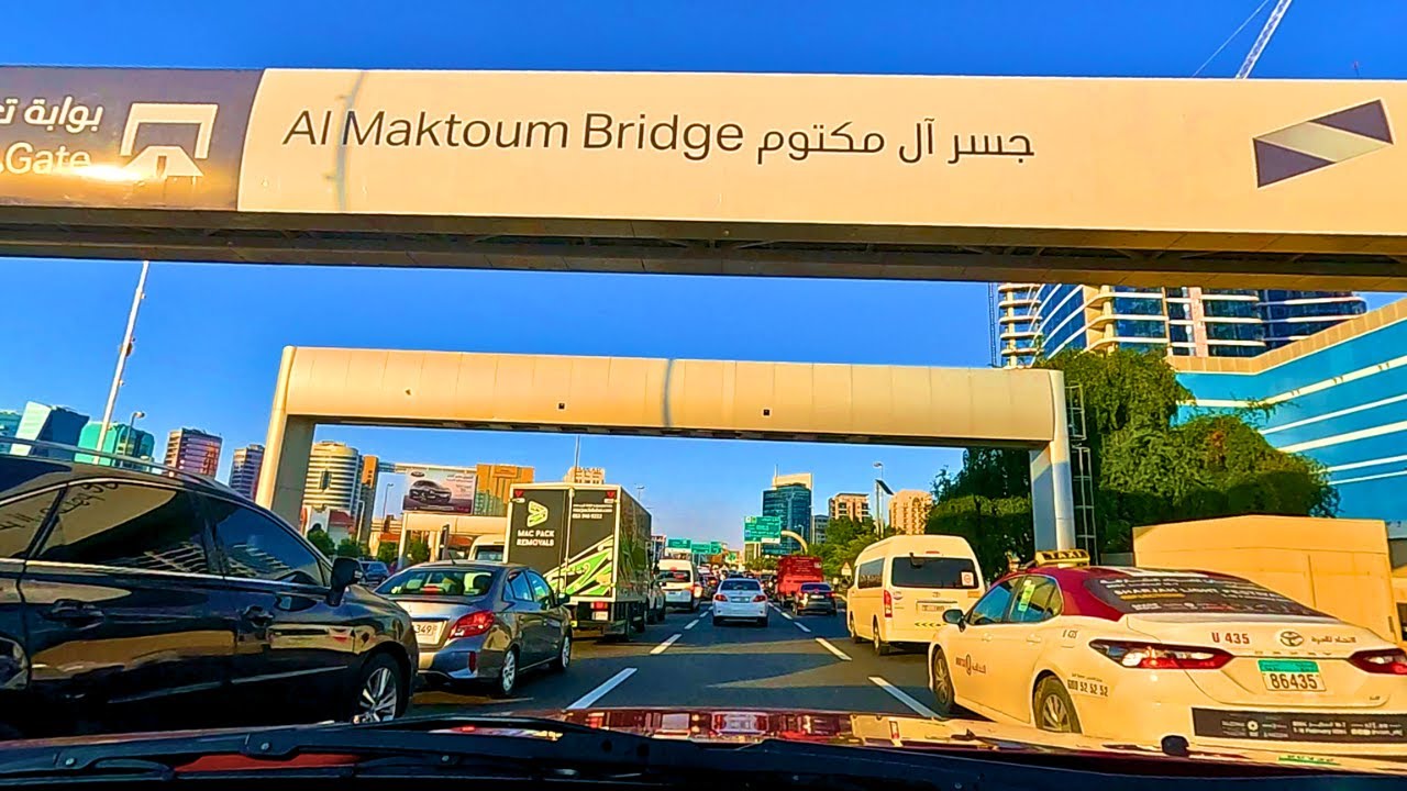 DUBAI RUSH HOUR AFTERNOON TRAFFIC FROM AL MAKTOUM BRIDGE TO AL ITTIHAD ...