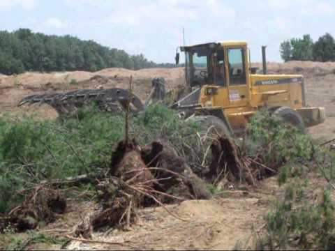 Craig Manufacturing - Land Clearing Rake on a Volvo Wheel Loader - YouTube