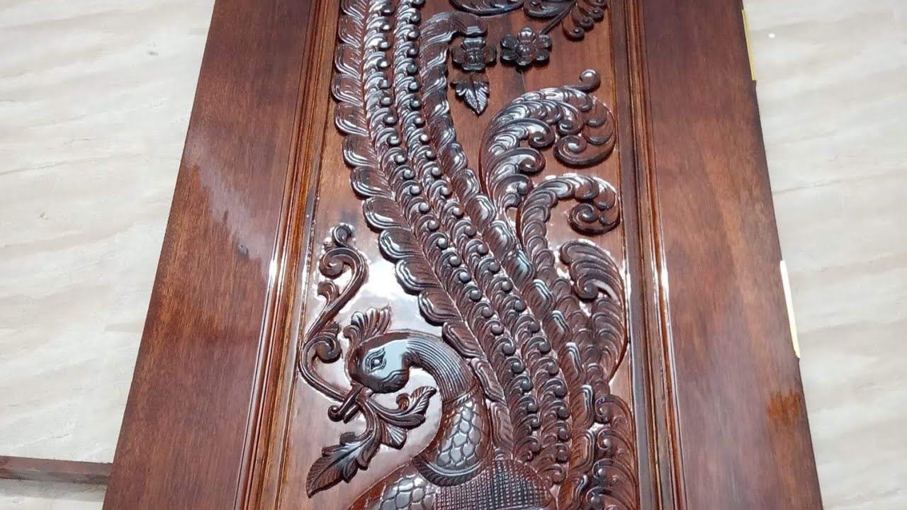 Wooden main door annaparavai wood craving design | Thakkolam Tamilarasu ...