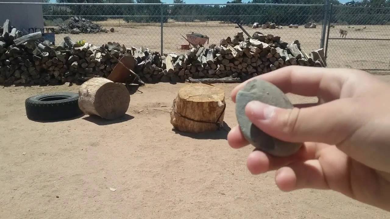 Throwing A Rock At A Piece Of Wood. - YouTube