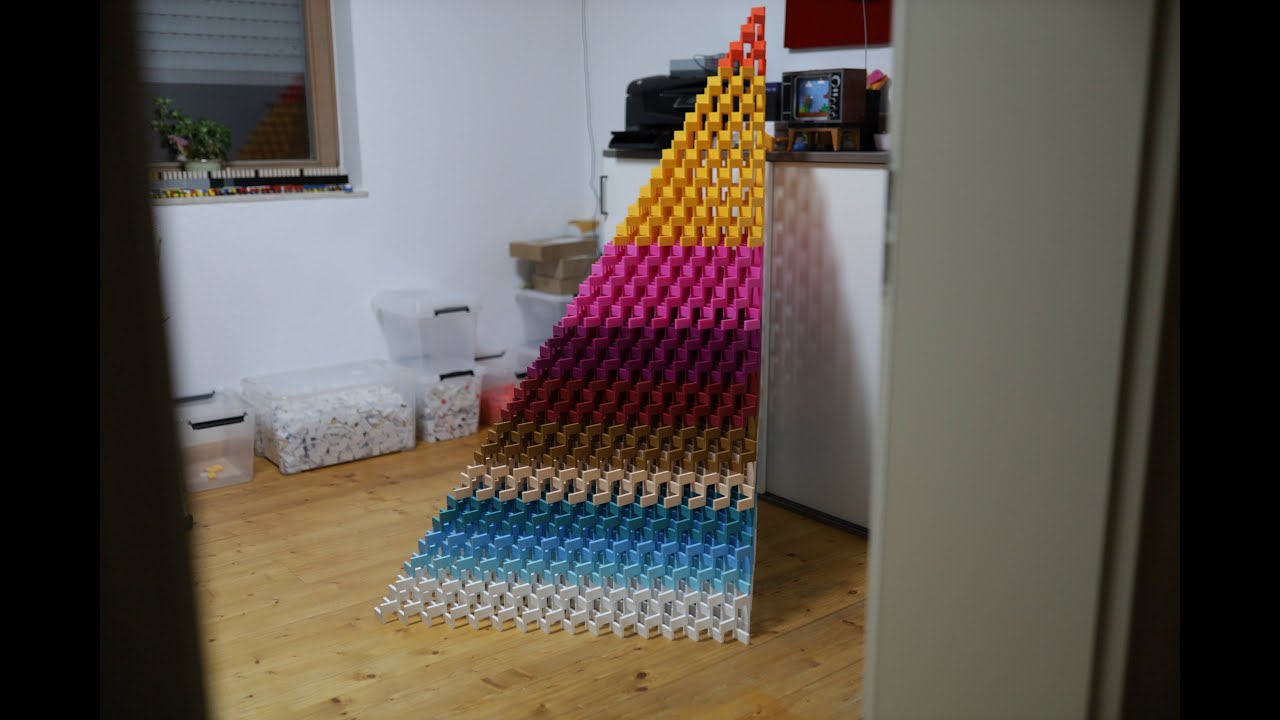 UNOFFICAL WORLD RECORD - Largest 3D Domino Quarter Pyramid - YouTube