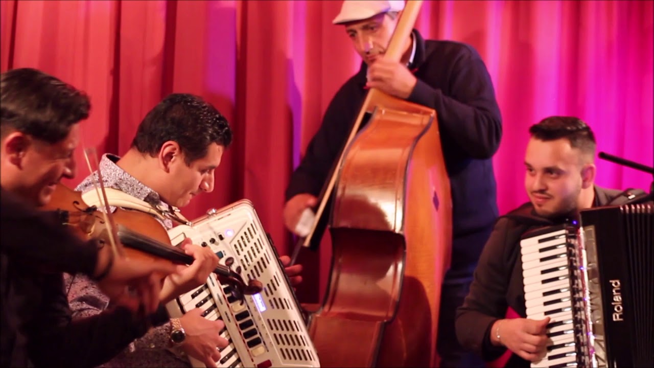 Paul Guta & Family performing Hora martisorului - YouTube