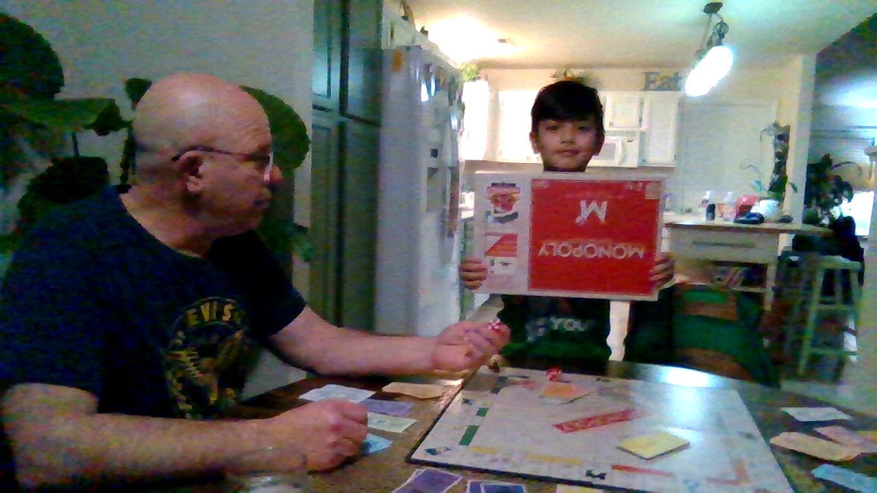 FATHER AND SON PLAYING MONOPOLY GAME - YouTube