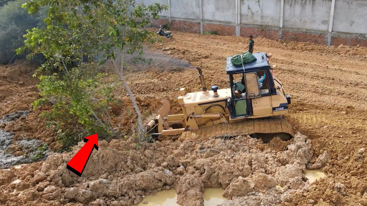 Skillfully Komatsu Dozer pushing rock to filling up landscape | Machine ...