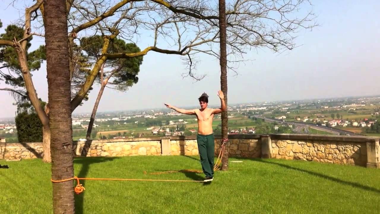 Slacklining on a static rope - YouTube