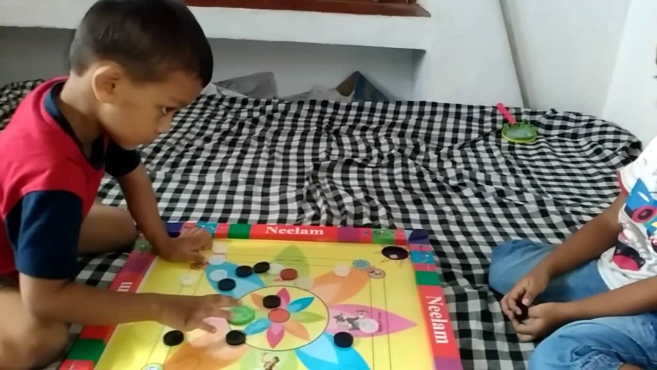 Carrom playing activities by kids - YouTube