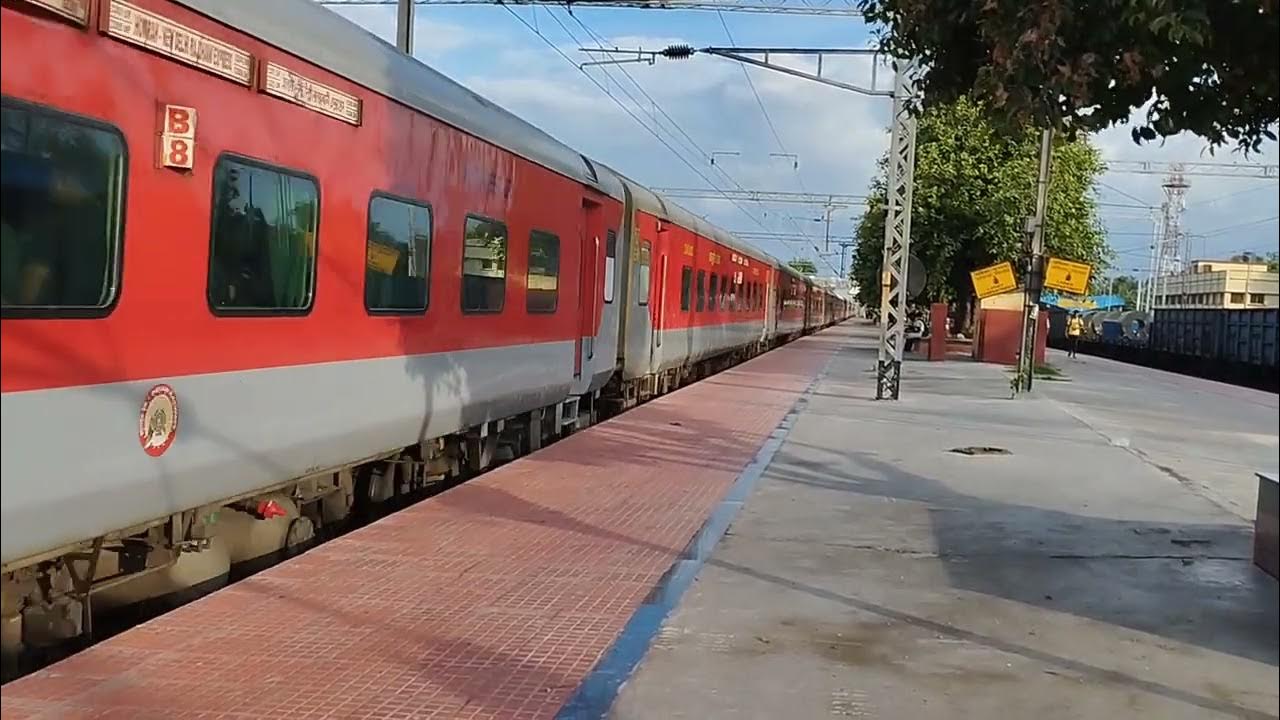 train no. 12301 up Howrah-New Delhi Rajdhani express with Howrah WAP-7 crossing through Janai ...
