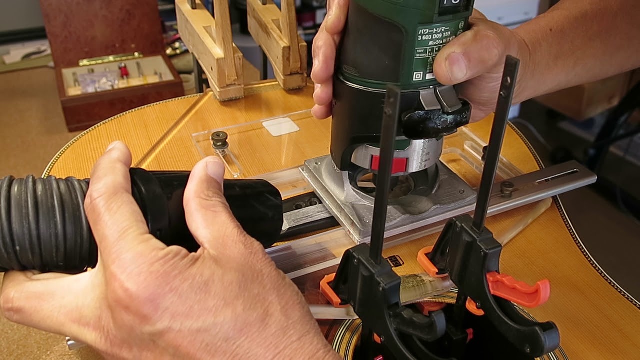 Saddle slot routing on Martin HD-28 - YouTube