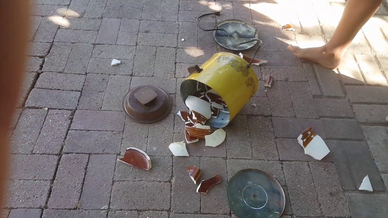 Smashing a Crock-Pot (featuring a finger on the left) - YouTube