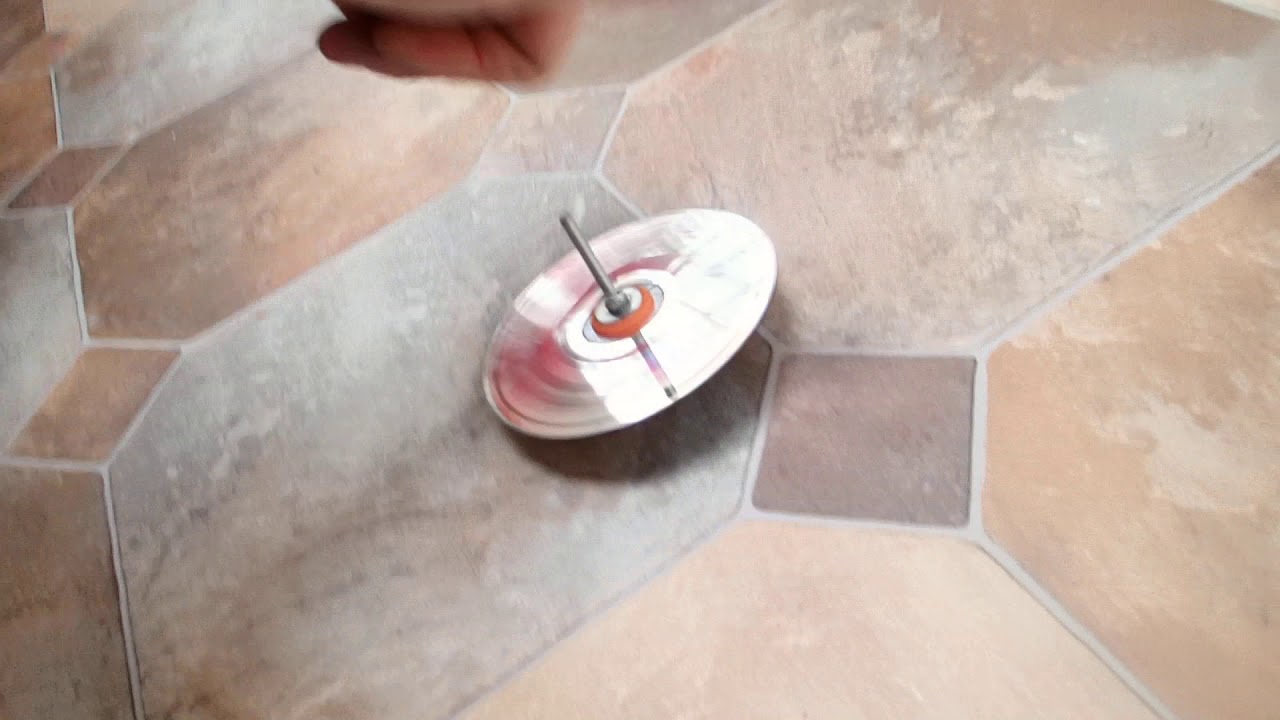3d printed cd spinning top and roller demo - YouTube