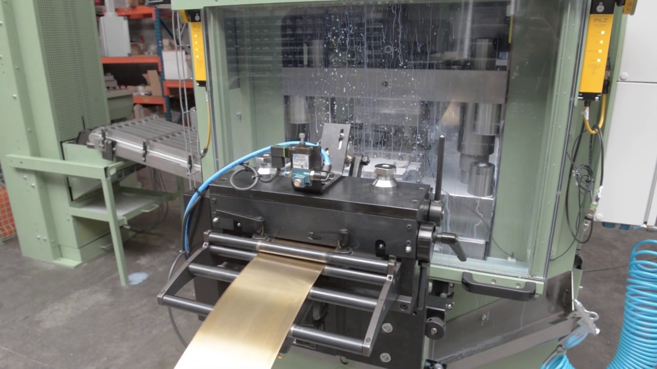 Vertical press - up to 120 000 pc/h - YouTube