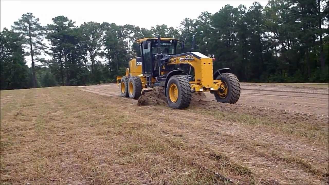 Deere 672G Motor Grader Grading Field - YouTube
