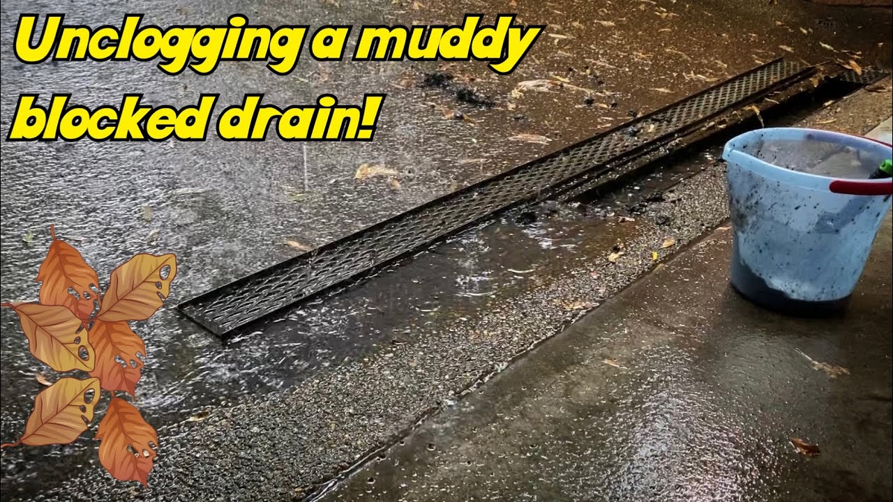 Unclogging a muddy drain in my garage. - YouTube