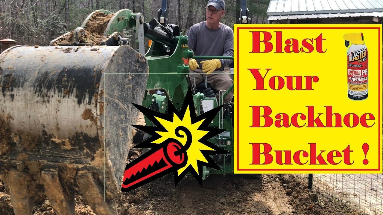 How to "Blast" the Clay out of the Backhoe Bucket of your JD 1025R & my ...