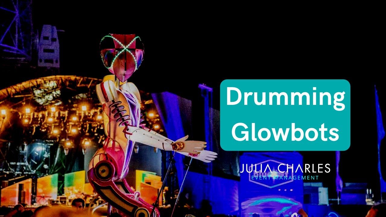 Drumming Glowbots | LED drumming robots on stilts for your event! - YouTube