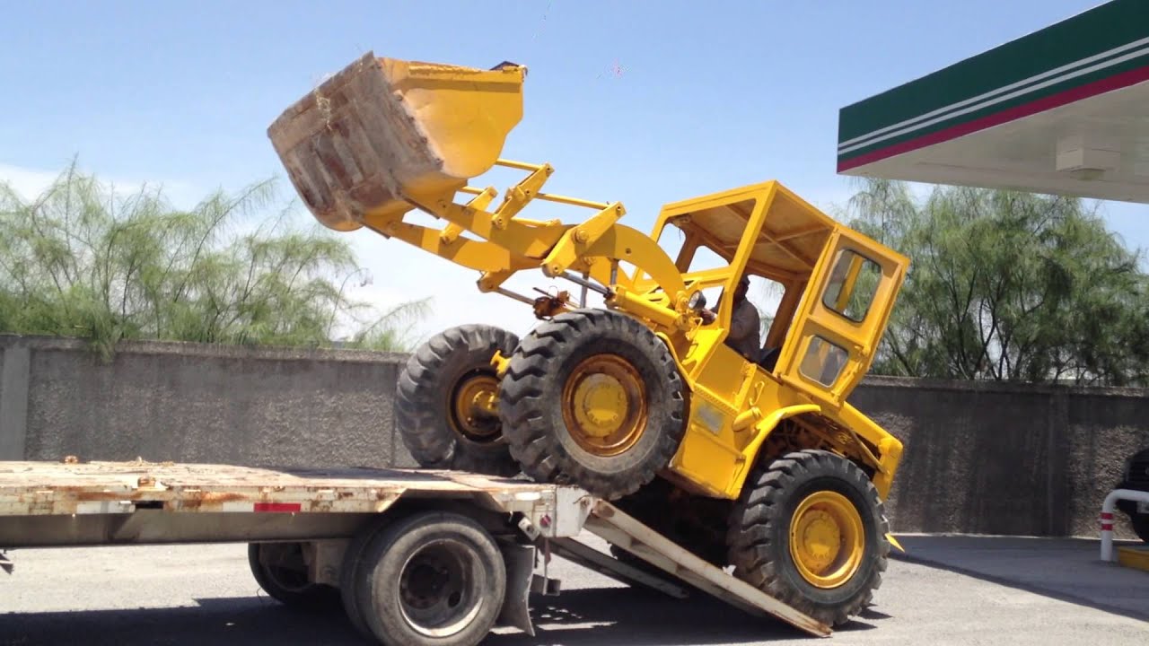 CARGADOR FRONTAL (TRASCABO) CATERPILLAR 922B - YouTube