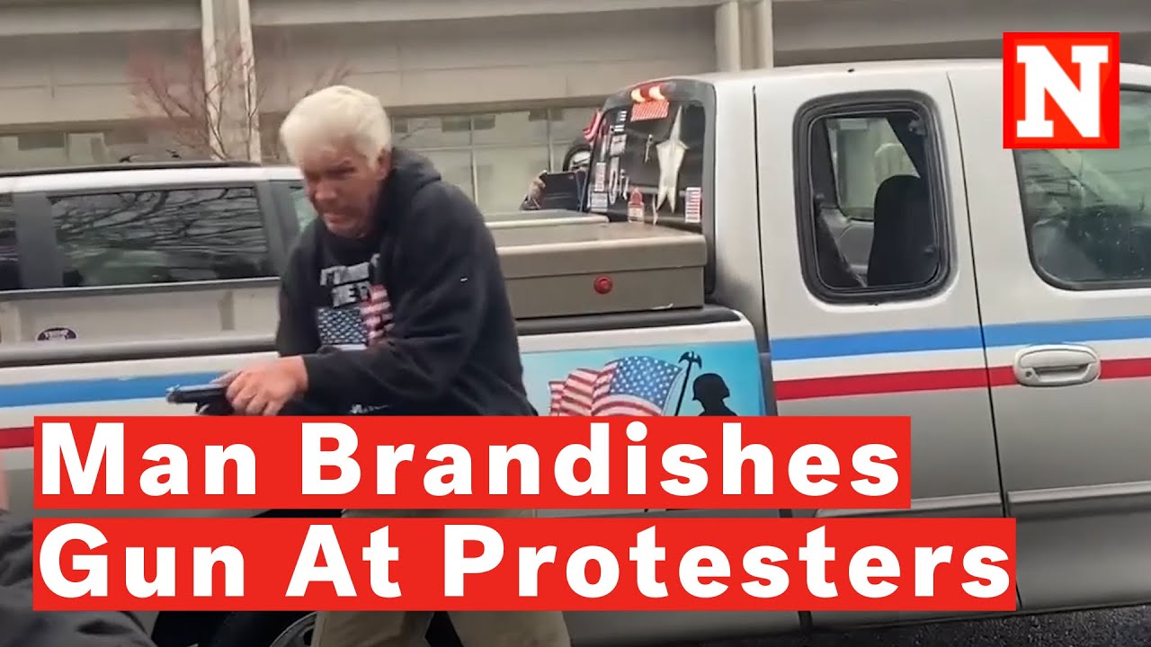 Watch: Man Brandishes Gun At Protesters And Yells 'Get Away From Me ...