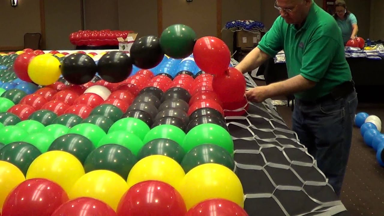 RouseAPPS™ NEW WORLD RECORD - 21 Balloons / 15 Seconds - YouTube