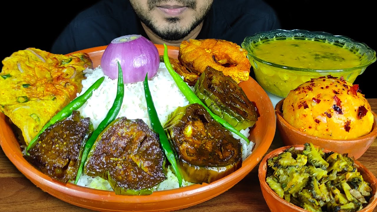 EATING MACH BHAJI, DAL, ALU BHORTA, BEGUN BHAJI,KOROLA BHAJI,DIM BHAJI ...