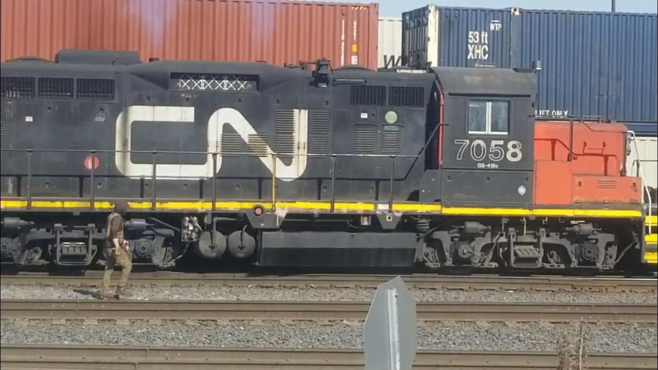 CN Locals EMD GP38-2 4717 GP9RM 7058 & GP9RM 4138 pulling Intermodal Containers in Brampton Yard ...
