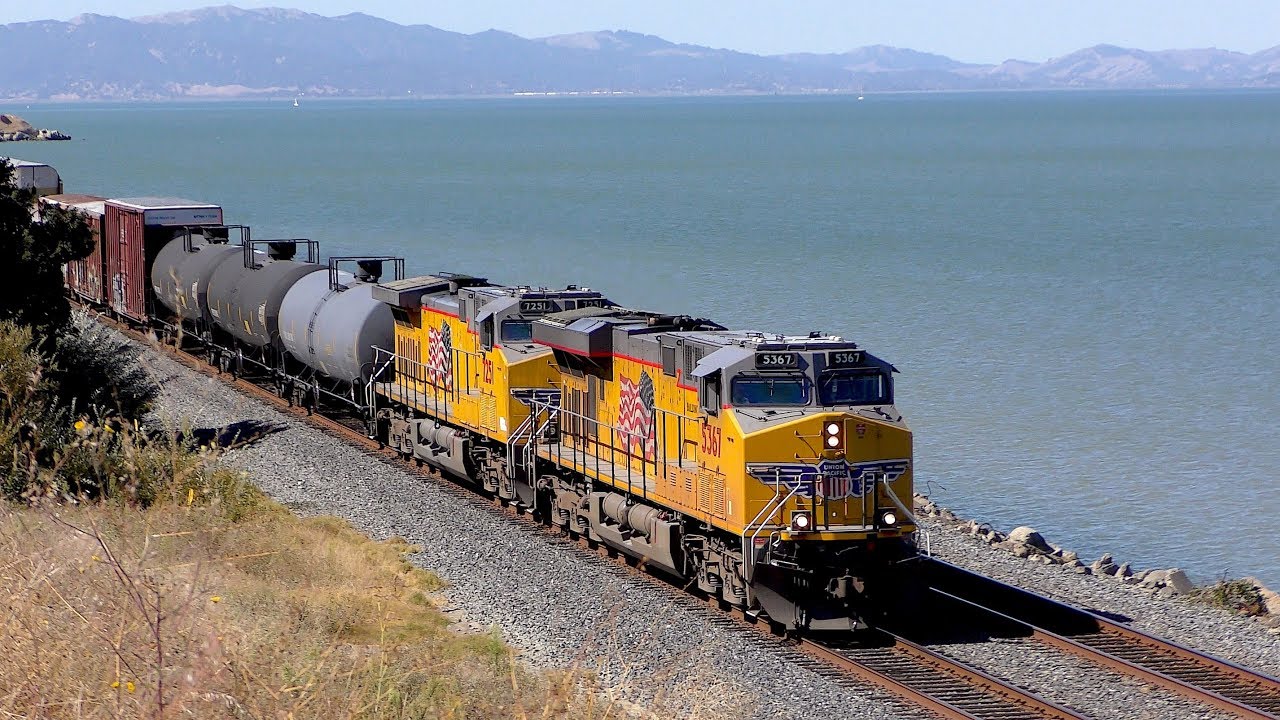 UNION PACIFIC Mixed formation with oil cars and auto cars seen at ...
