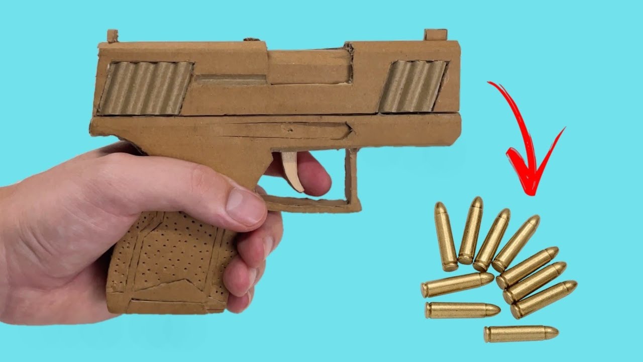 COMO FAZER UMA PISTOLA DE PAPELÃO QUE ATIRA - YouTube