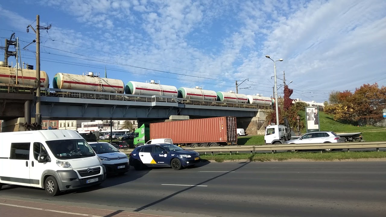 2M62UM-0090 with freight train near from main station Riga-Passenger ...