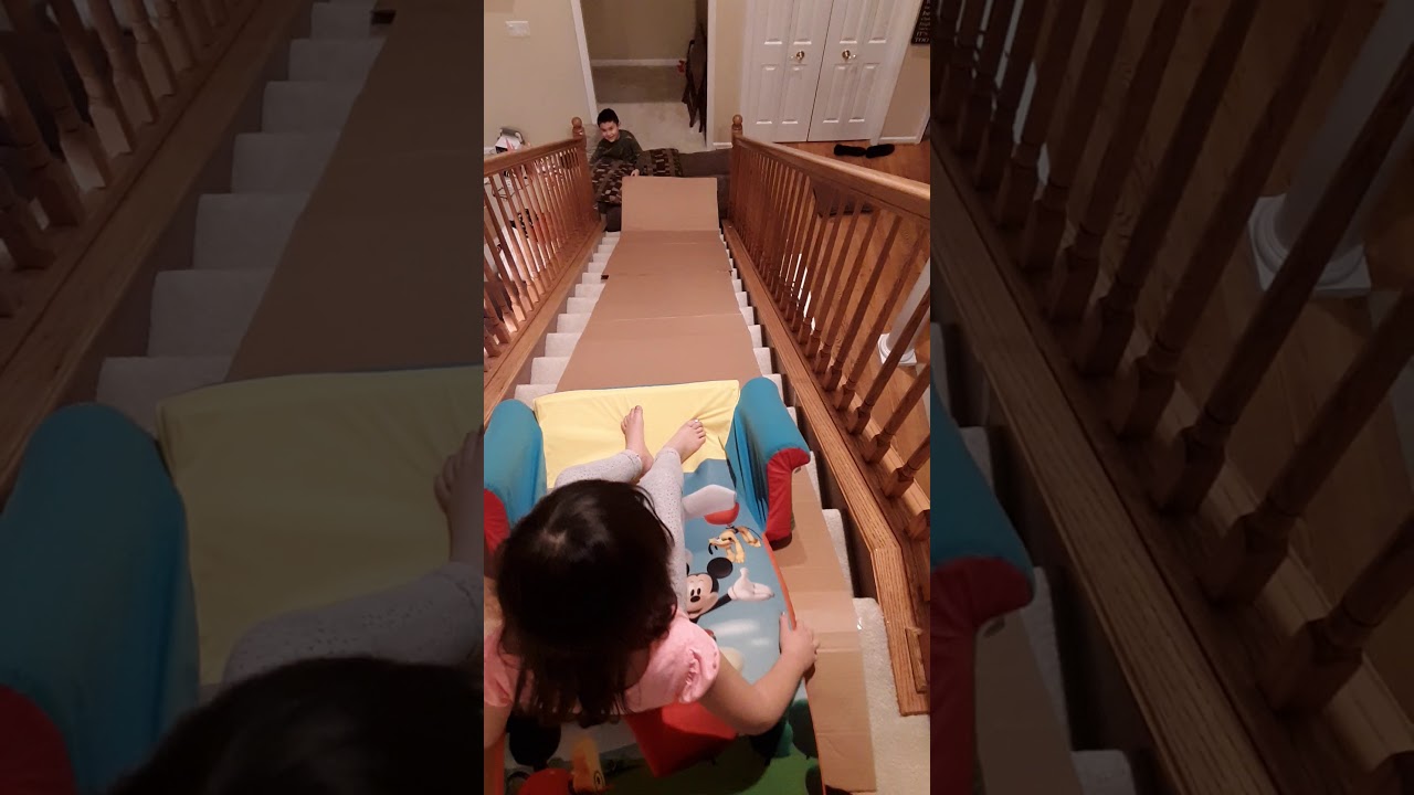 Cardboard slide on staircase - YouTube