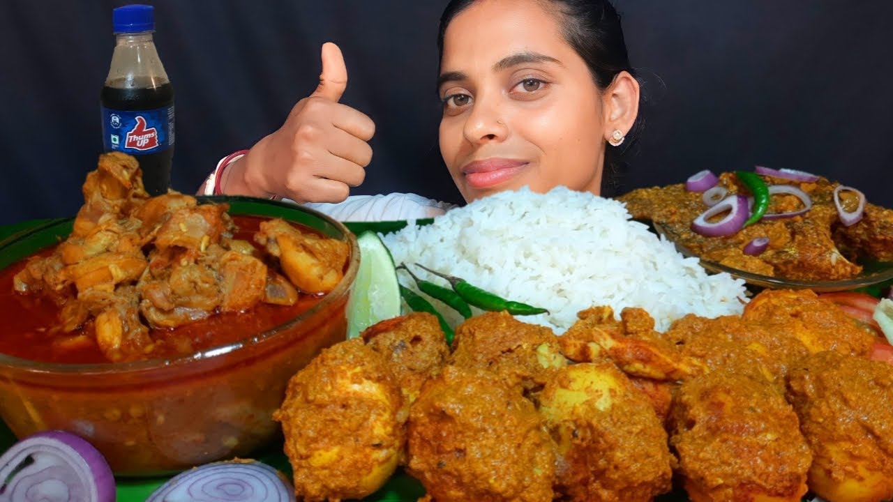 Eating Rice With Spicy Chicken Curry And Fish Curry Spicy Egg Masala ...