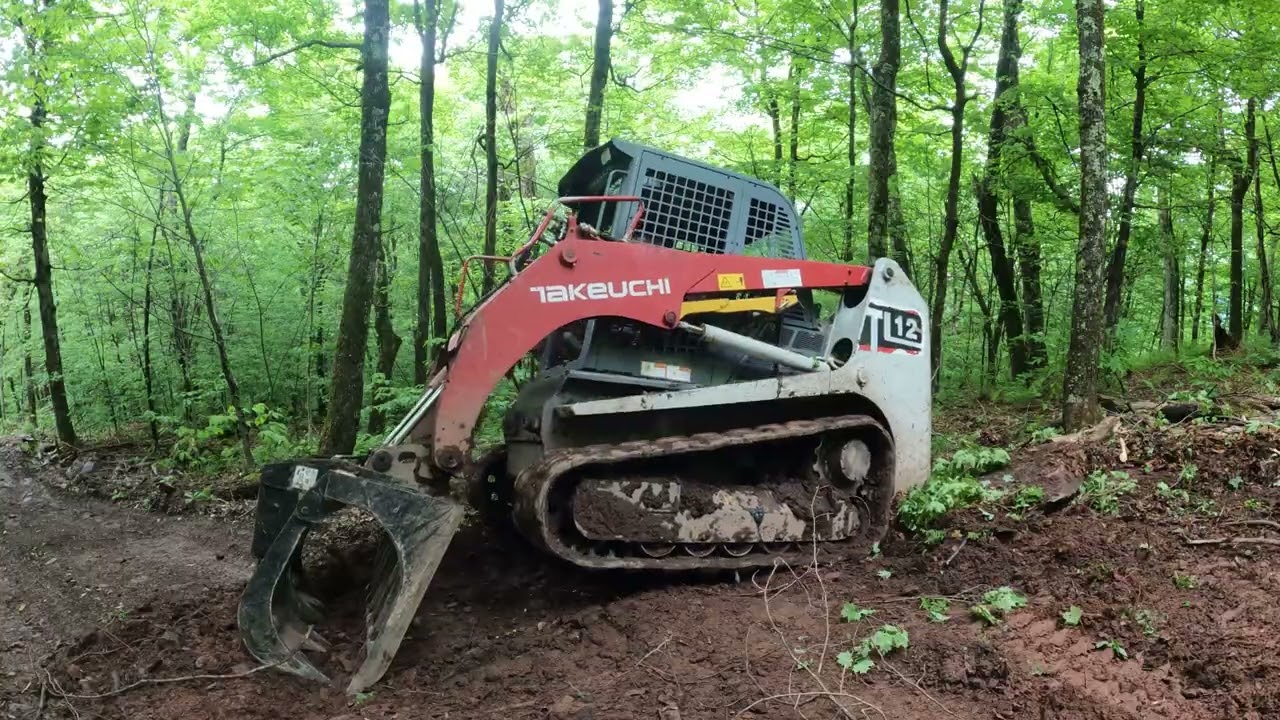Fixing a track and moving wood. - YouTube