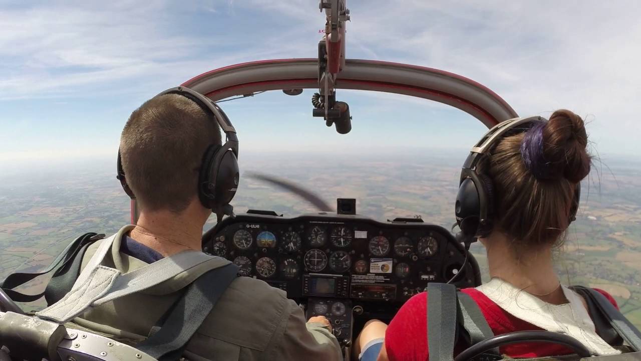 Charlotte's First Aerobatic flight - YouTube
