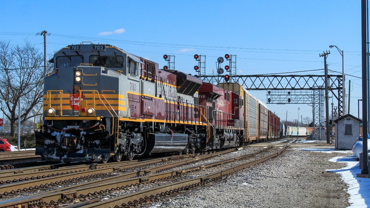 CP 7013 (Heritage SD70ACU) leads CP 141 into Bensenville Yard! - YouTube