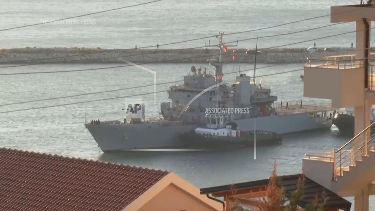First migrants arrive in Albania on Italian navy ship as part of new ...