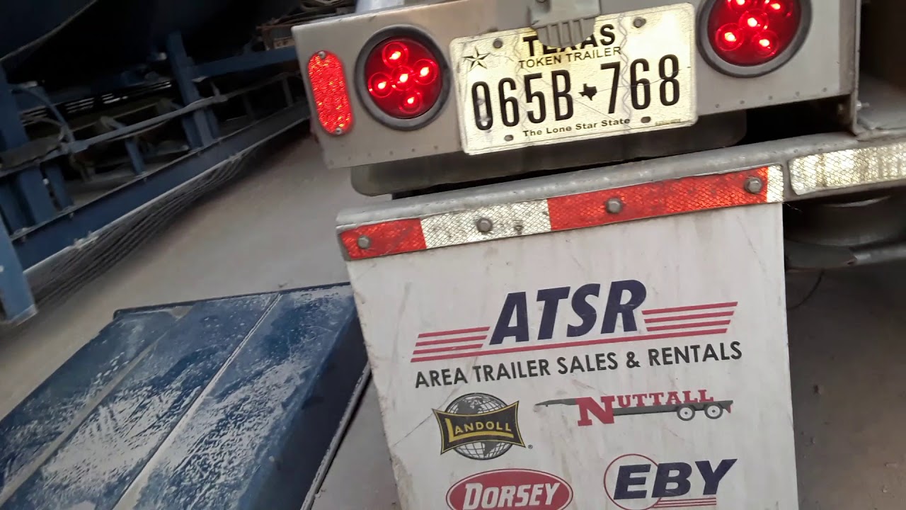 Unloading frac sand with a pneumatic trailer - YouTube