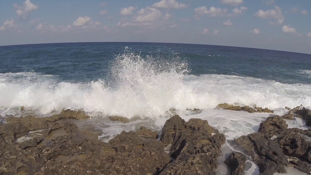 Water sea rolling waves hit shoreline small splashes - YouTube