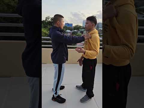 Self defense technique against collar grab and holding - YouTube