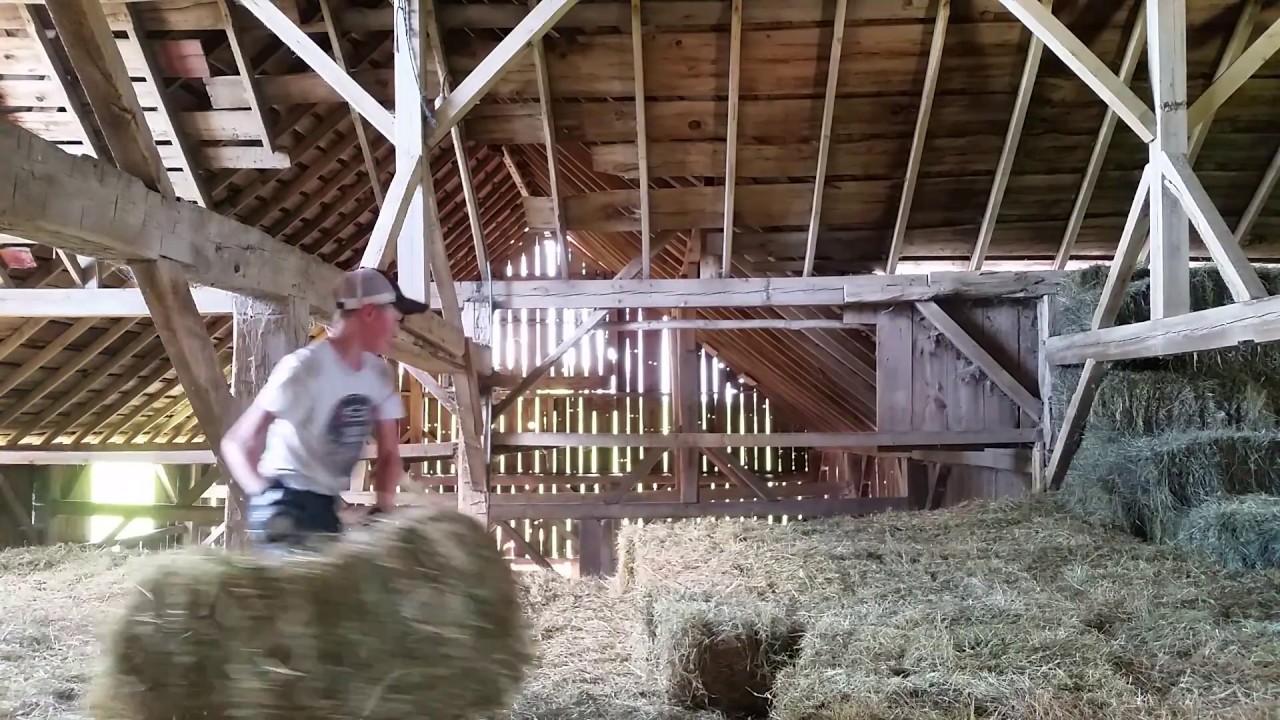Stacking hay (part 1) - YouTube