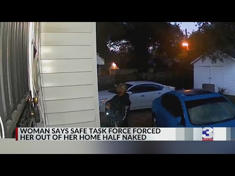 Half-naked woman forced out of her home by task force raid