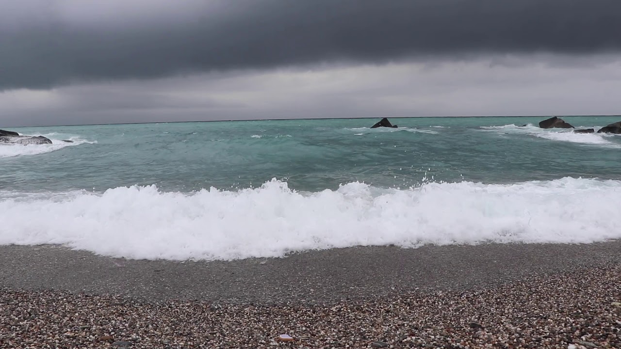 Riposto, Sicily, Italy Beach scene 1 hour wave loop volcanic rock 1080p ...