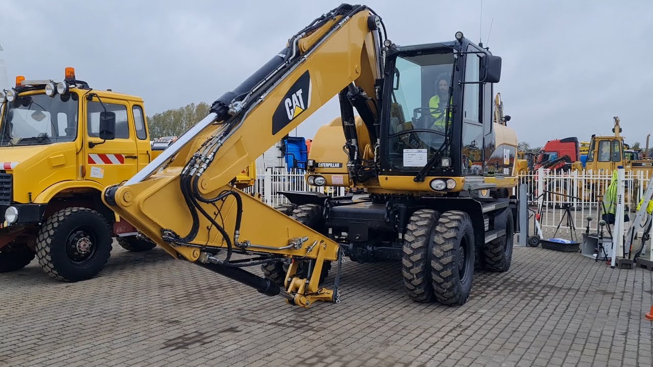 70154875 Caterpillar M316D - YouTube