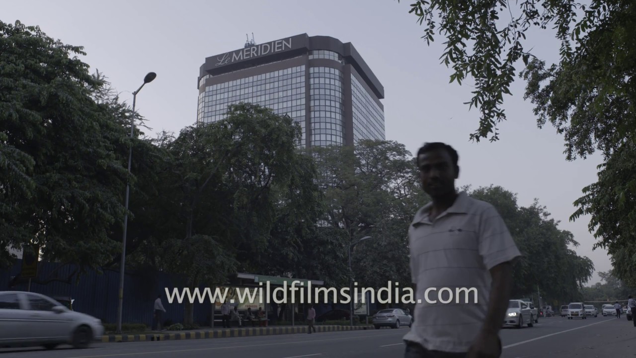 People wait for the bus at Janpath bus stand, New Delhi - Timelapse ...