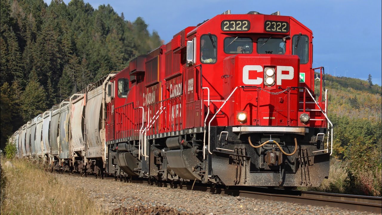 Small CP Exshaw manifest train Eastbound near Sunalta on the Laggan subdivision. - YouTube
