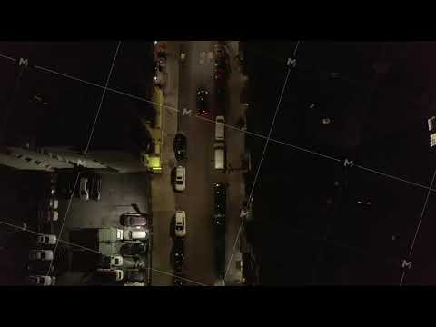 AERIAL: Dark Parking Lot Overhead Top Down Overhead Top Down Birds View at Night in Chinatown