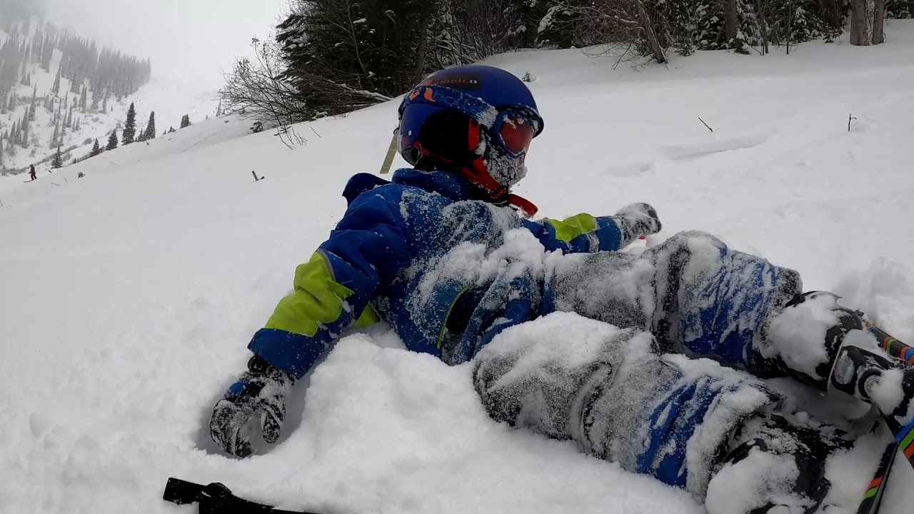 Little Boy Falls While Skiing Down A Snowhill - YouTube