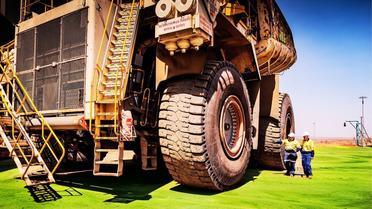 The power and performance of giant mining trucks revealed. - YouTube