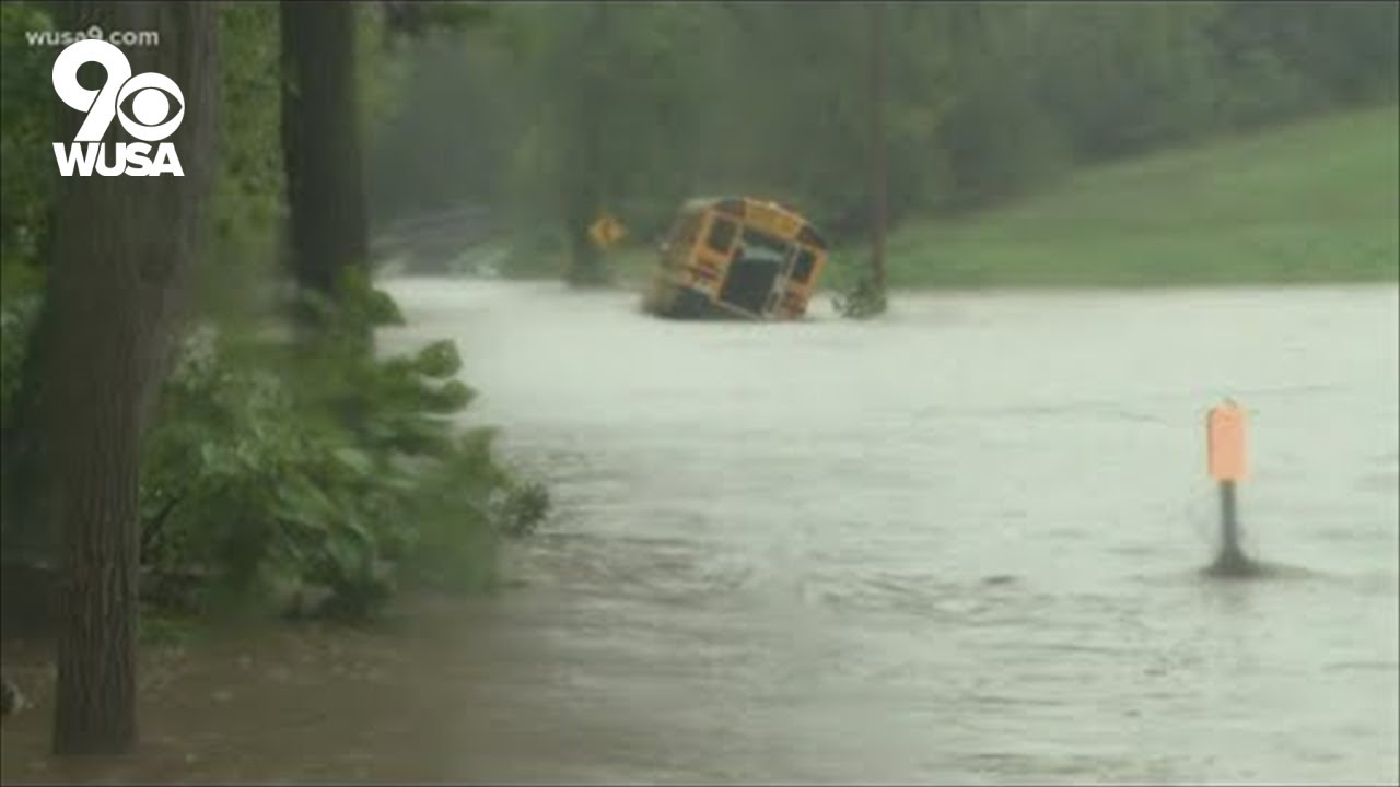 10 students rescued from school bus stuck on flooded bridge in ...
