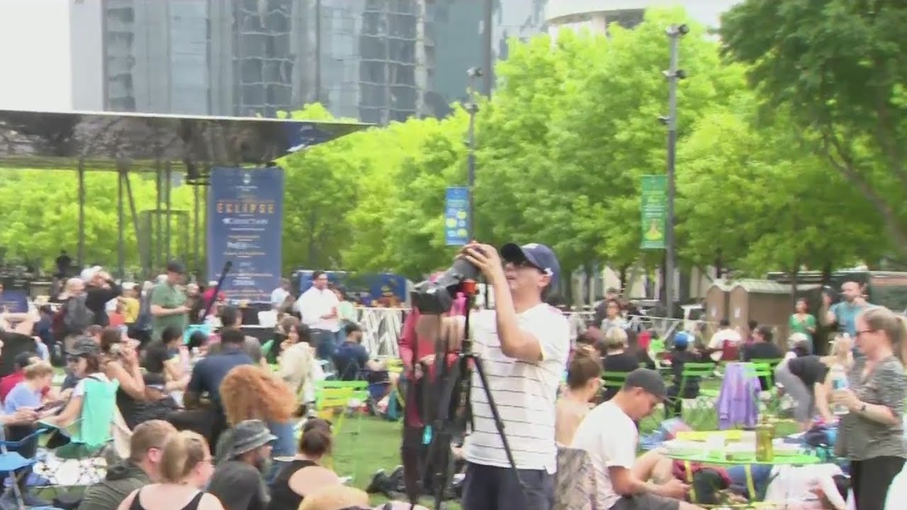 Crowds pack Klyde Warren Park in Downtown Dallas ahead of total solar ...